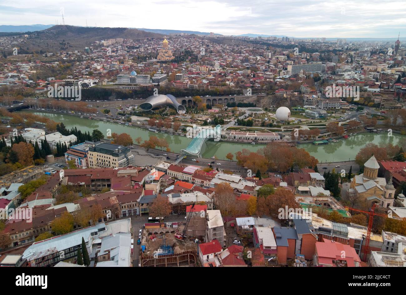 An aerial view of modern buildings surrounded by trees Stock Photo - Alamy