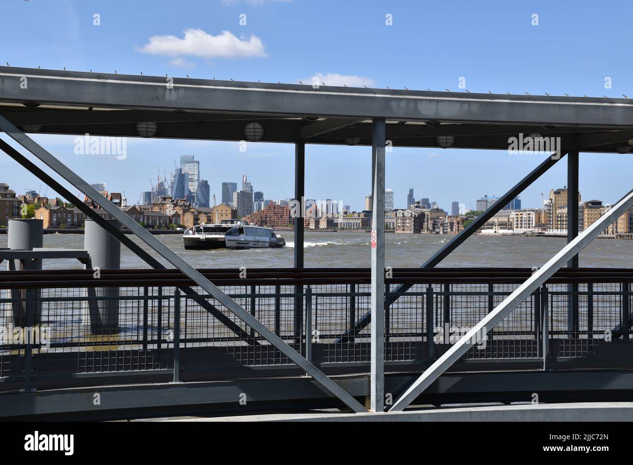 Uber Thames Clipper in front of London skyline wide angle Stock Photo ...