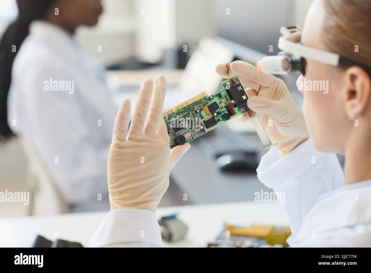 Inspecting experiment in laboratory hi-res stock photography and images ...