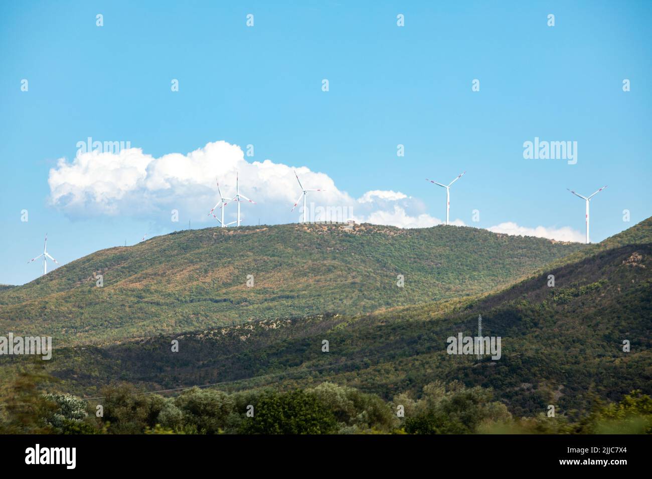 wind plant green energy at Greece mountains Stock Photo - Alamy