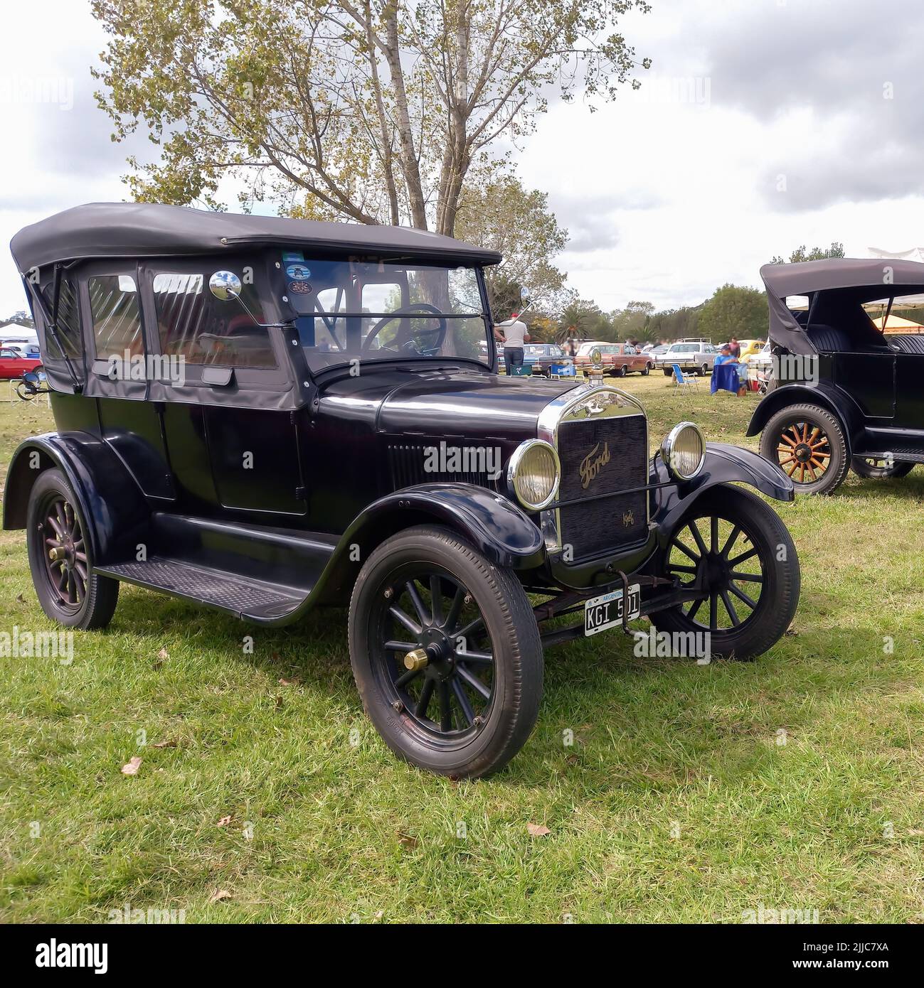 Old black Ford Model T Fordor Phaeton 1926 in the countryside. Nature ...