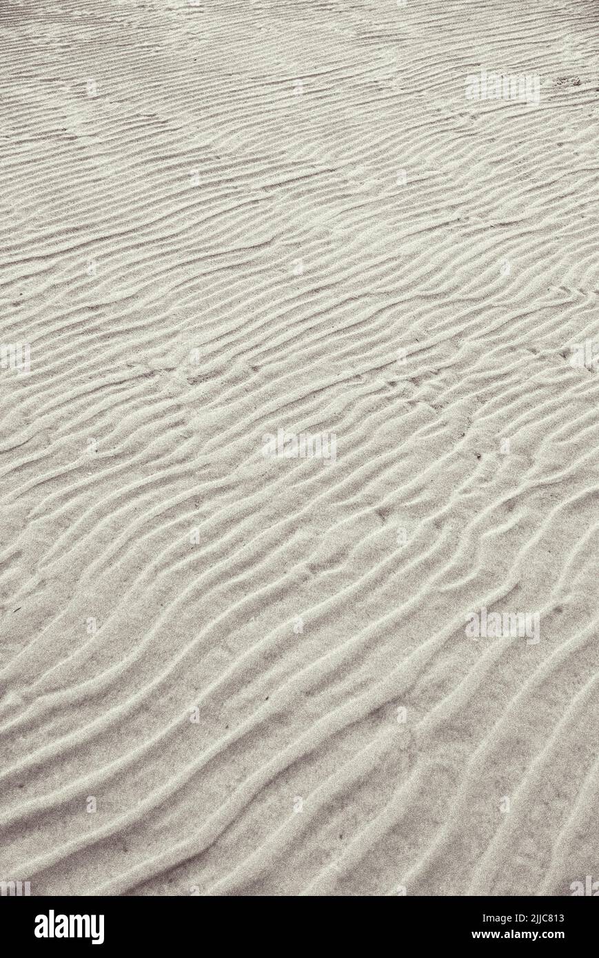 A vertical shot of the sand texture at the beach Stock Photo - Alamy