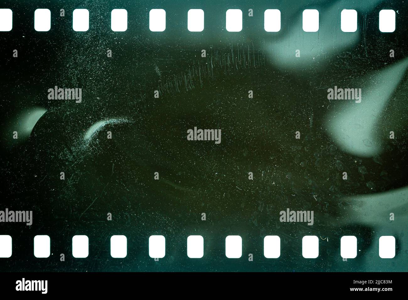 Dusty and grungy 35mm film texture or surface. Perforated scratched ...