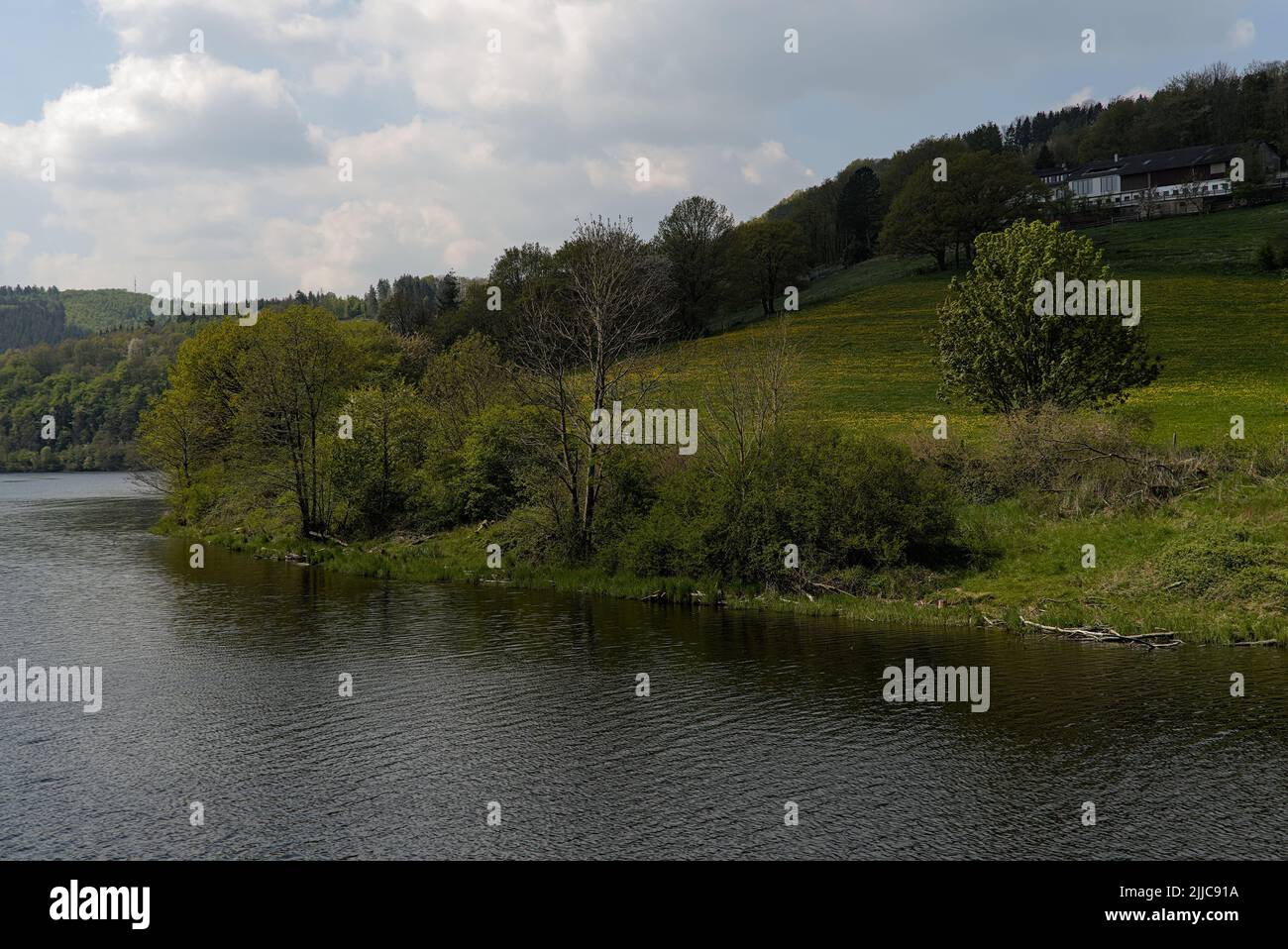A beautiful view of the sea near the mountains in National Park Eifel ...