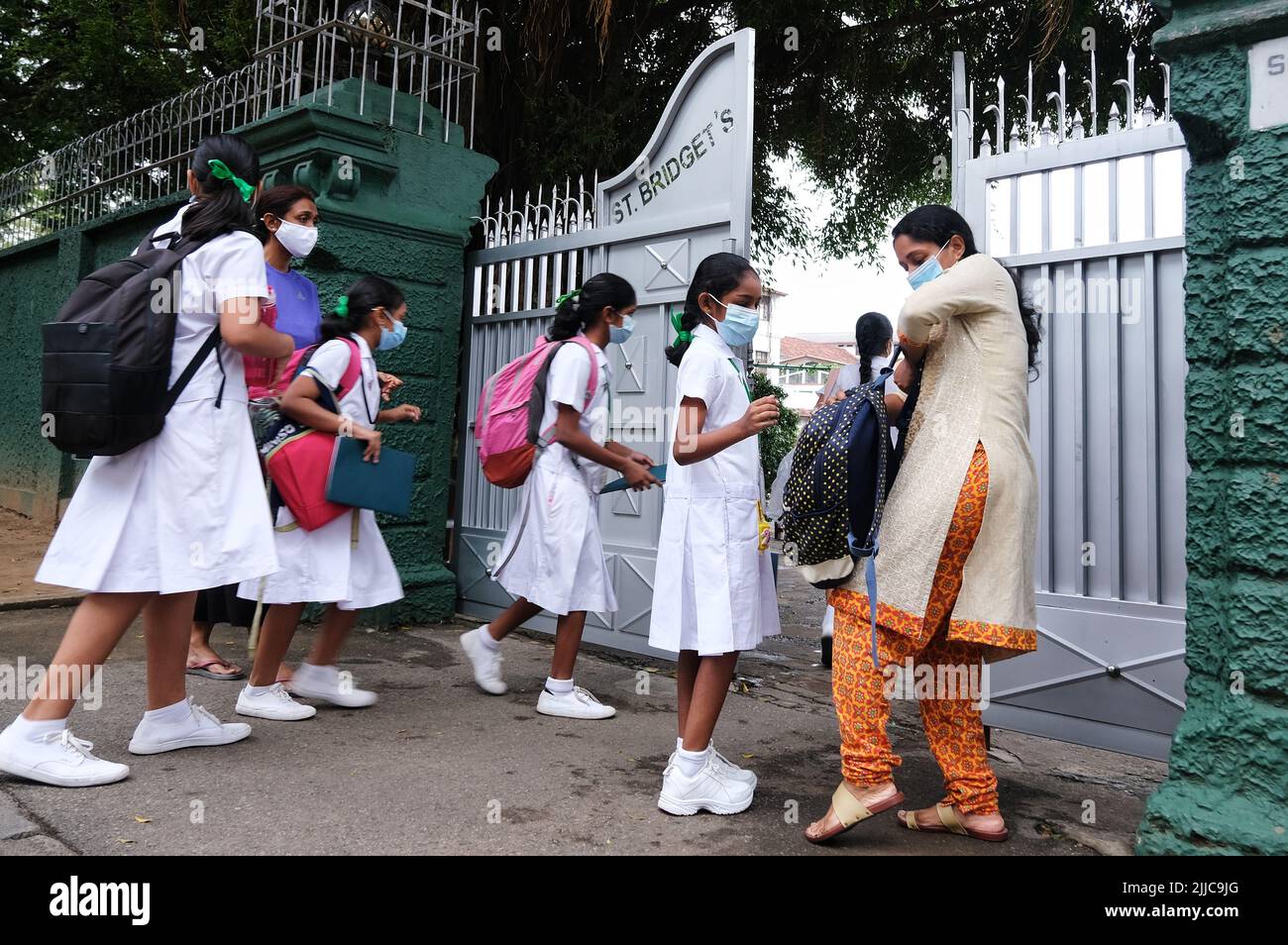 Colombo, Sri Lanka. 25th July, 2022. Students walk to their school in ...