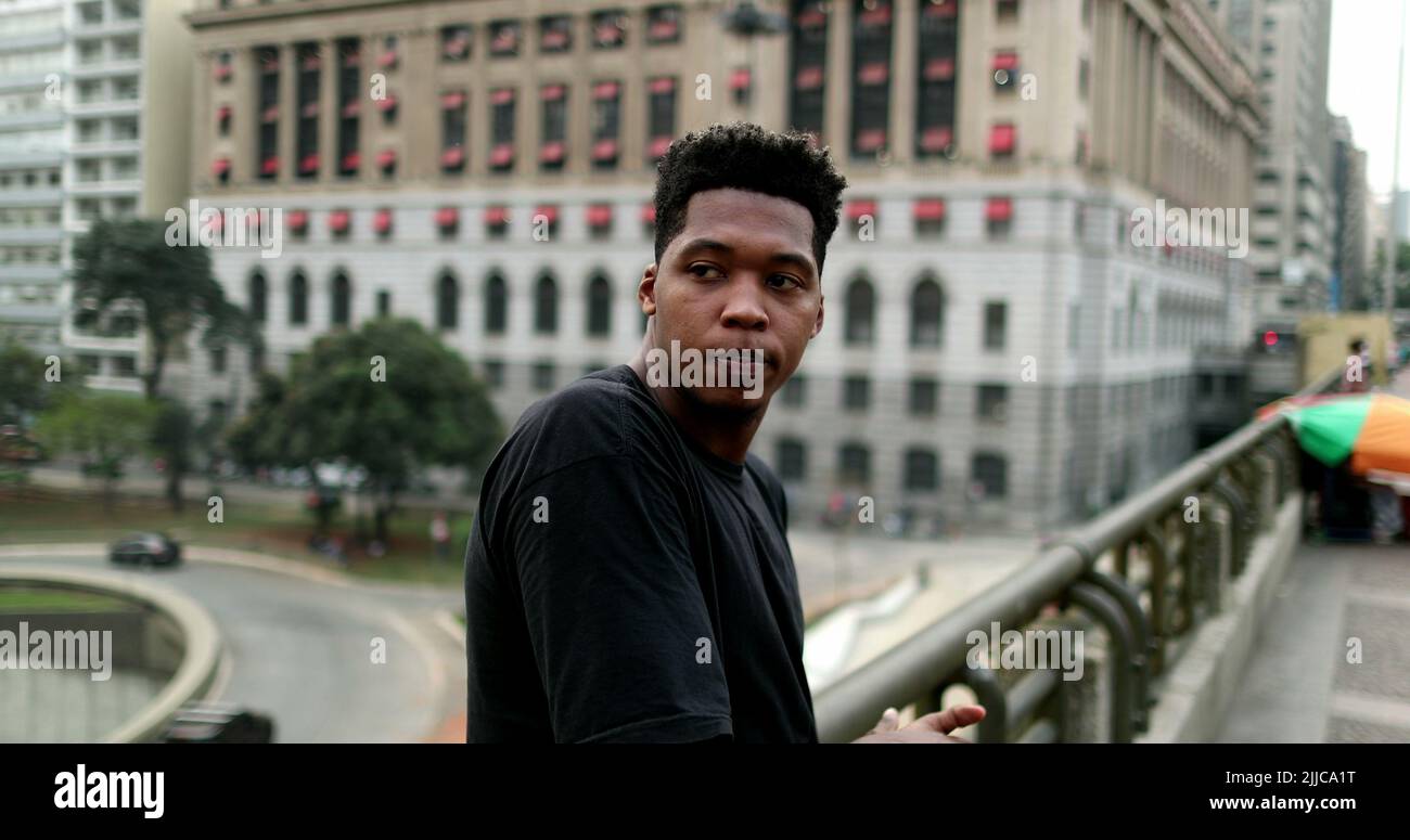 Frustrated young black man in downtown. Pensive African guy in urban ...