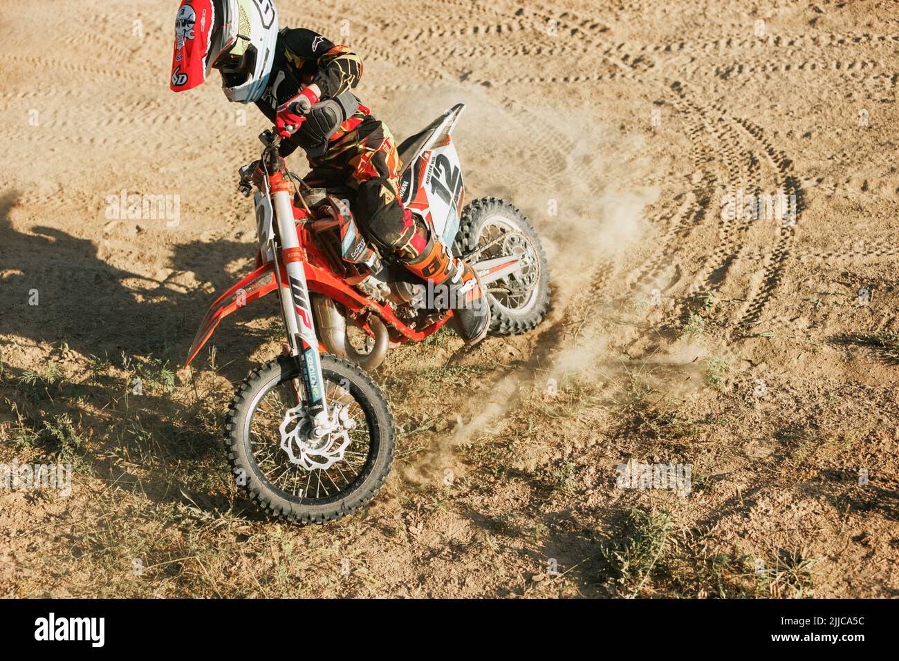 Dnipro, Ukraine JULY 01, 2022. Ukrainian beginner motorcycle rider ...