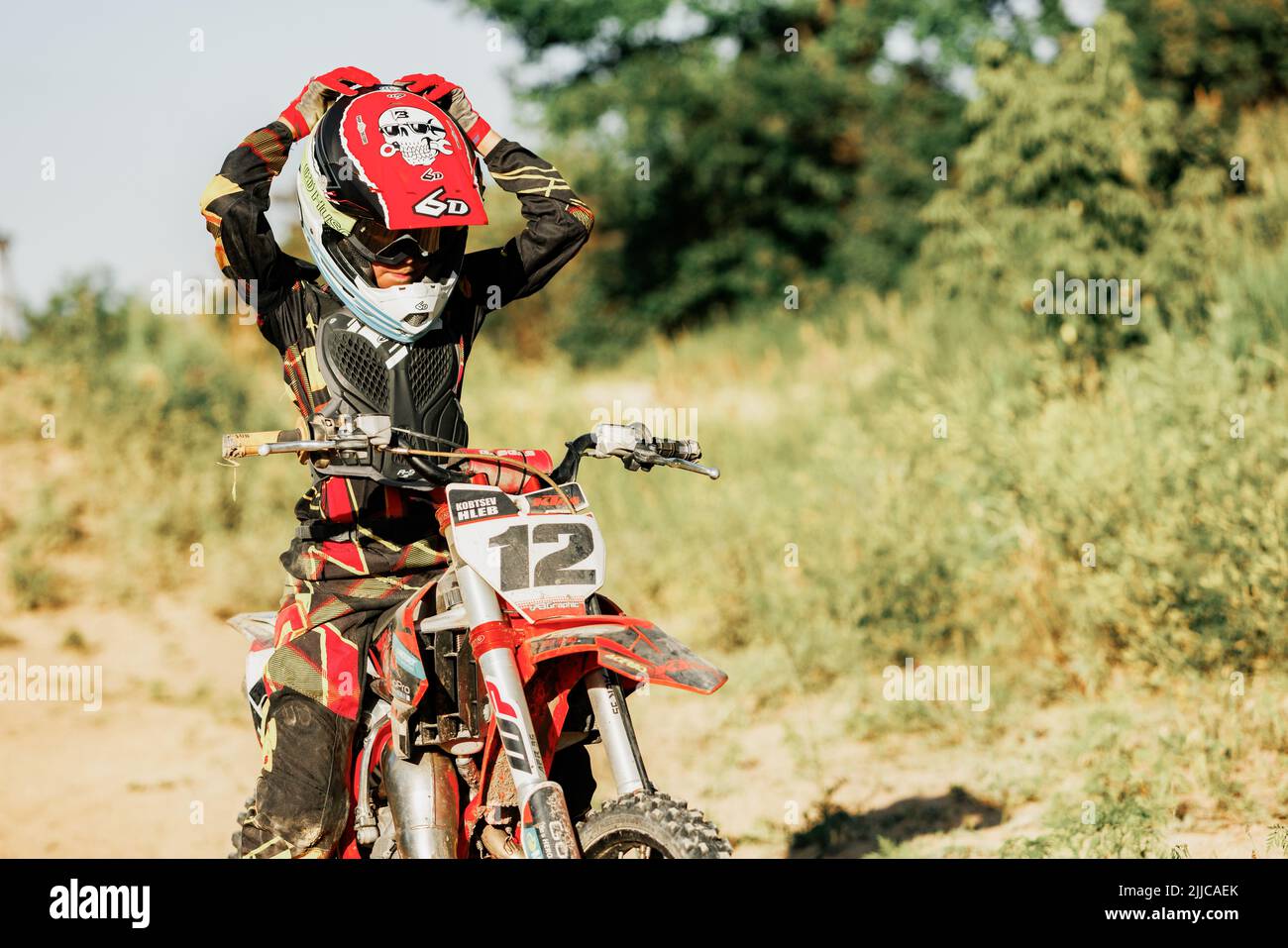 Dnipro, Ukraine JULY 01, 2022. Ukrainian beginner motorcycle rider ...