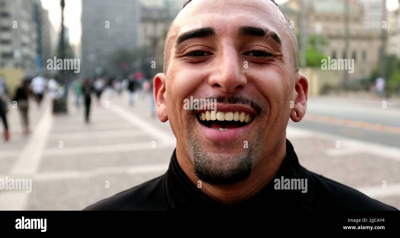 Happy hispanic man feeling relief. Latin south american person taking a ...