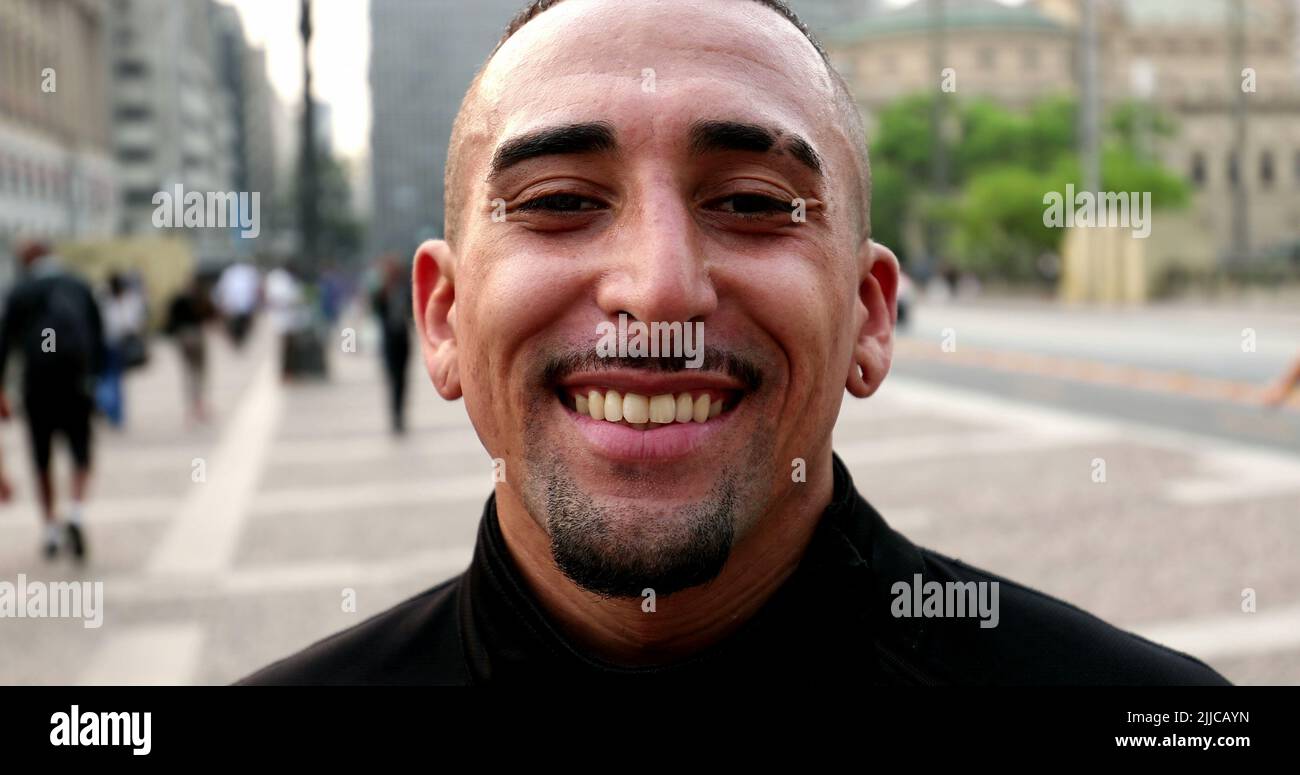 Happy hispanic man feeling relief. Latin south american person taking a ...