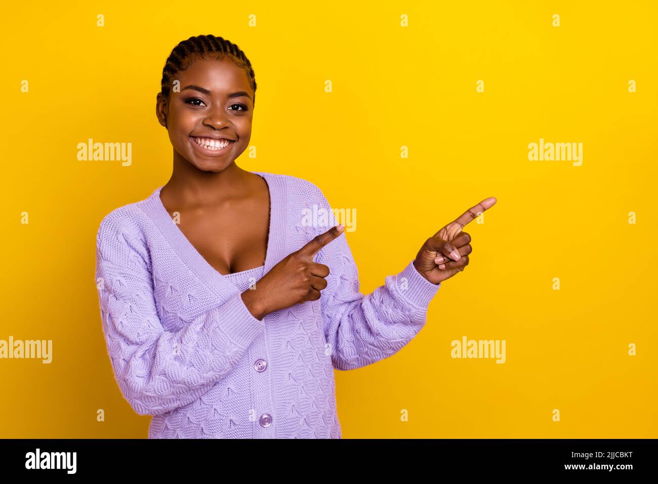 Photo of pretty positive person indicate fingers empty space blank ...