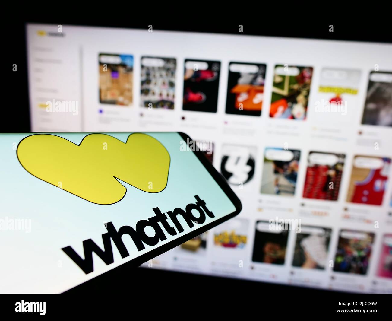 Mobile phone with logo of US e-commerce company Whatnot Inc. on screen ...