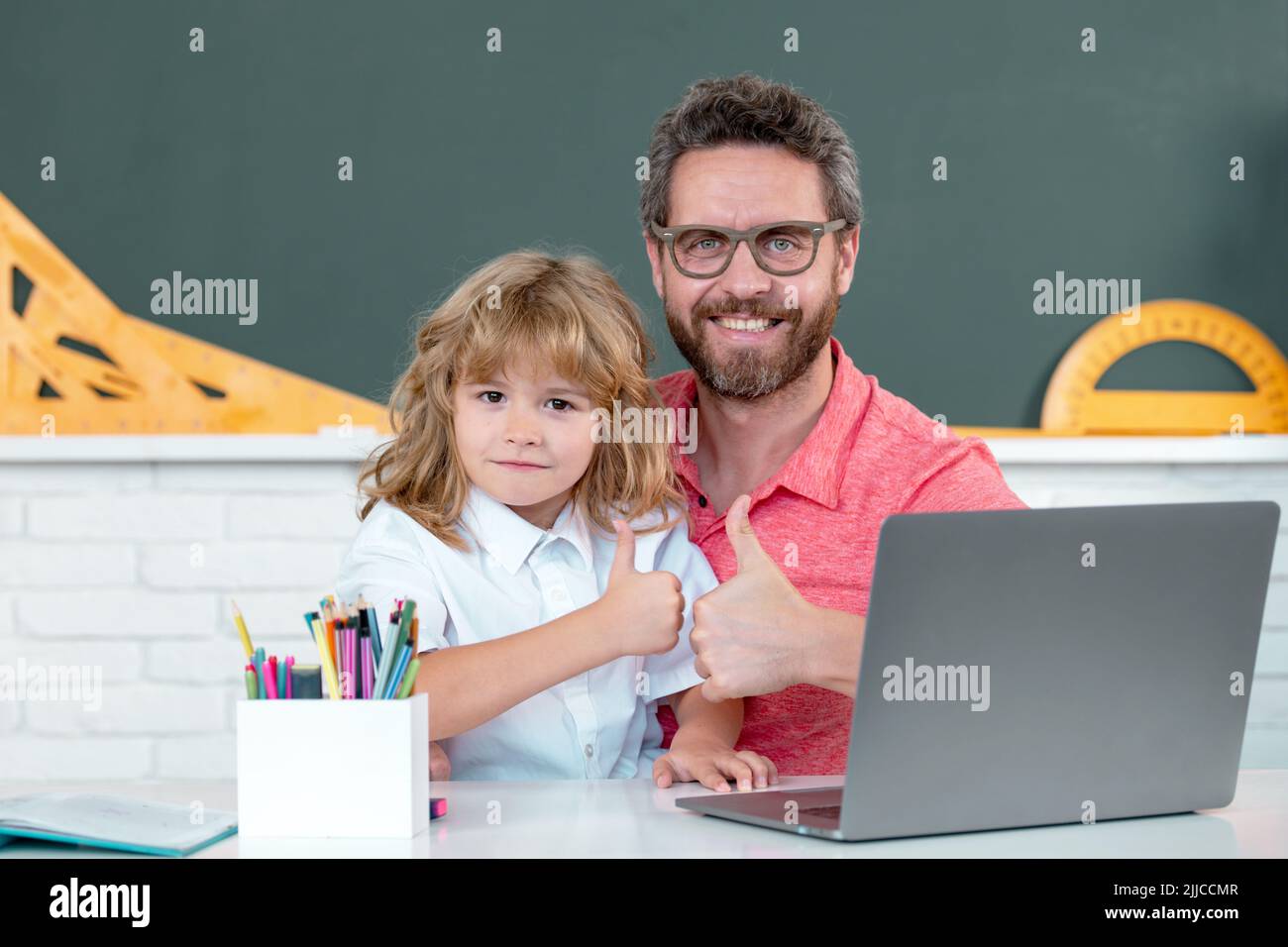 Back to school. First day at school. Cute little boy studying lesson in ...