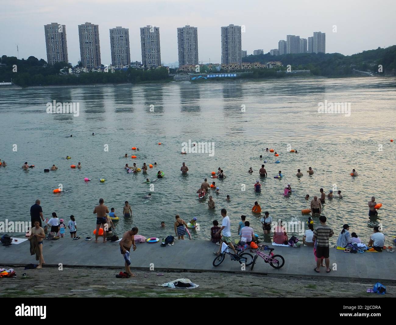 YICHANG, CHINA - JULY 25, 2022 - A large number of citizens bathe in ...