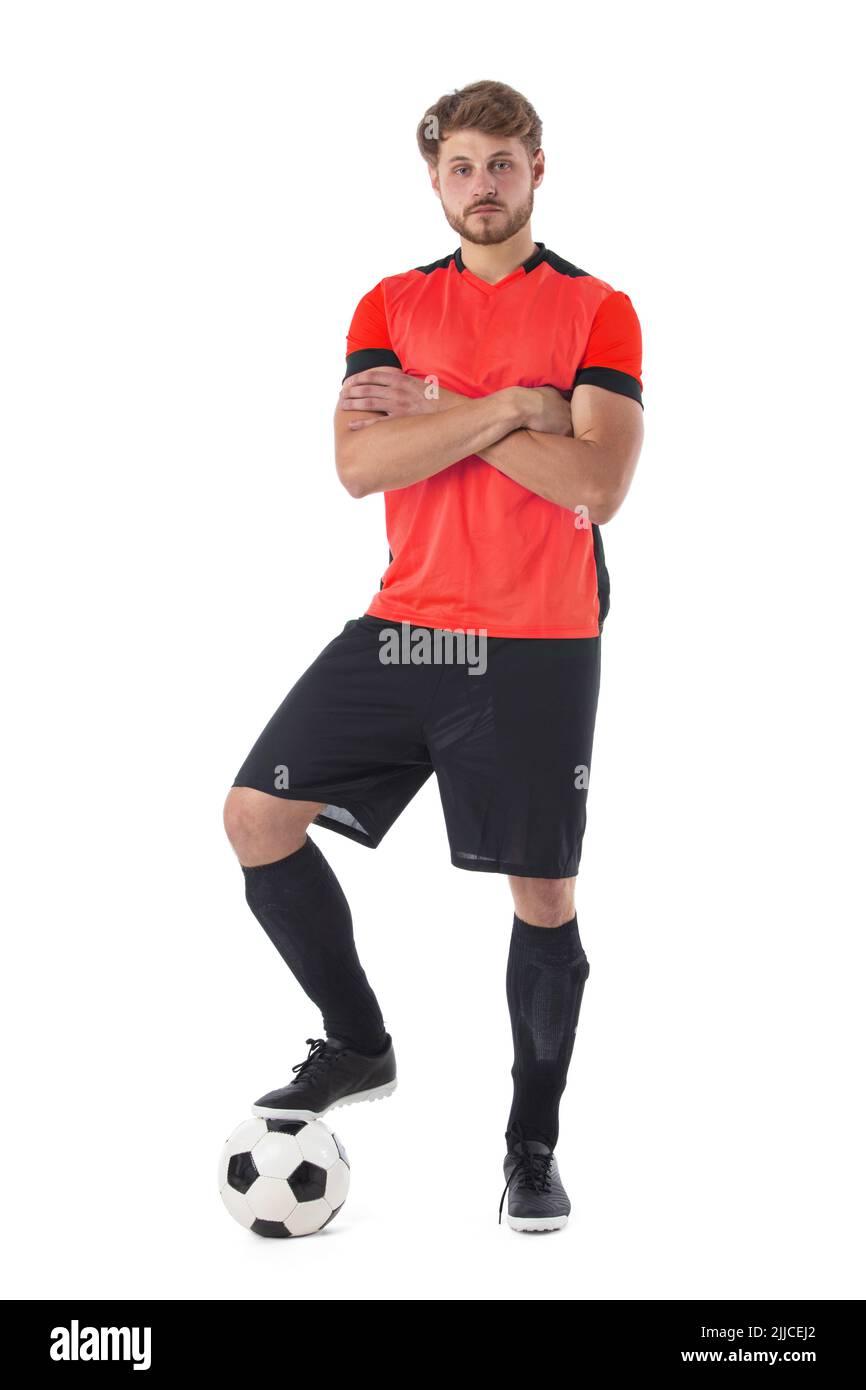 Full length portrait of a soccer player with ball isolated on white ...