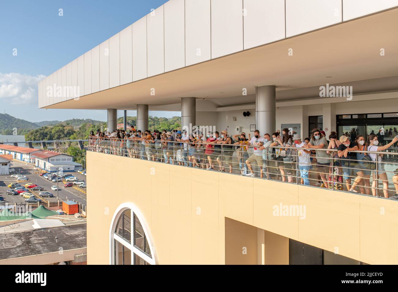 People watching the ships pass through Miraflores Locks in the Panama ...