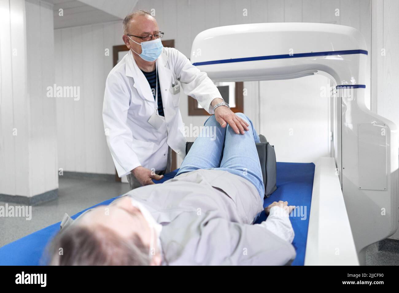 Doctor preparing a patient for x-ray tests Stock Photo - Alamy