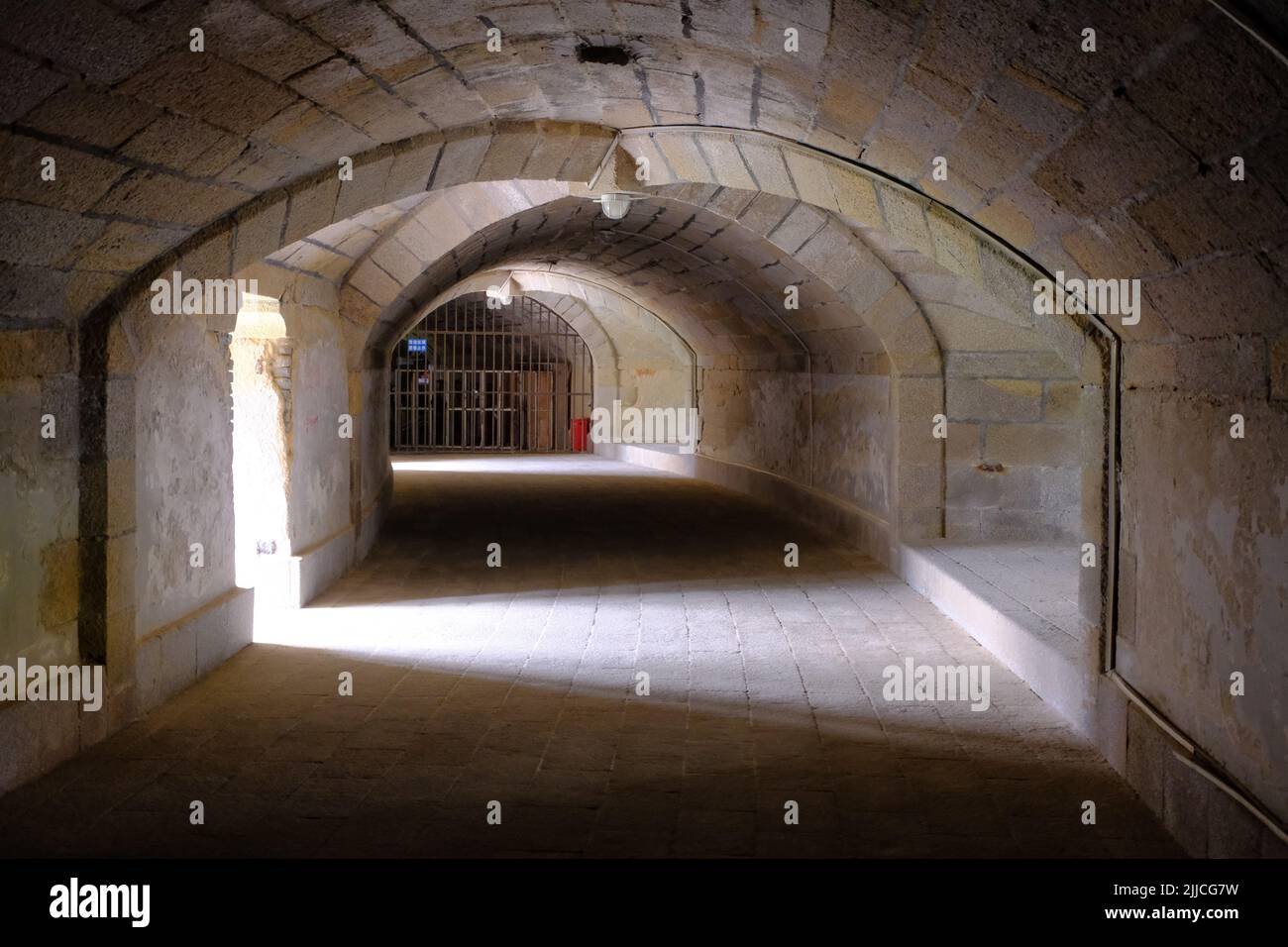 A stone corridor underground with windows Stock Photo - Alamy