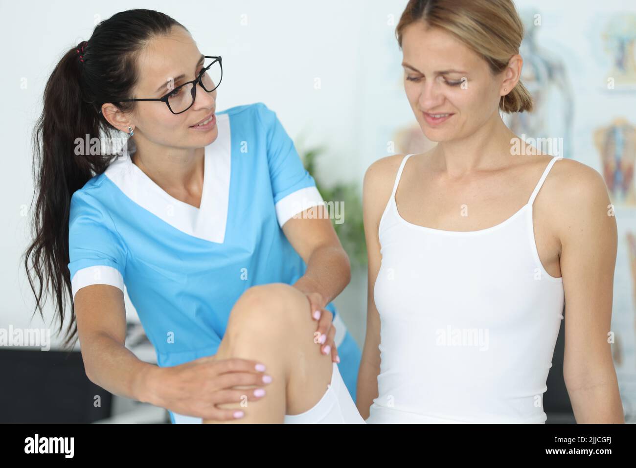 Female patient receiving medical care in rehabilitation center after ...