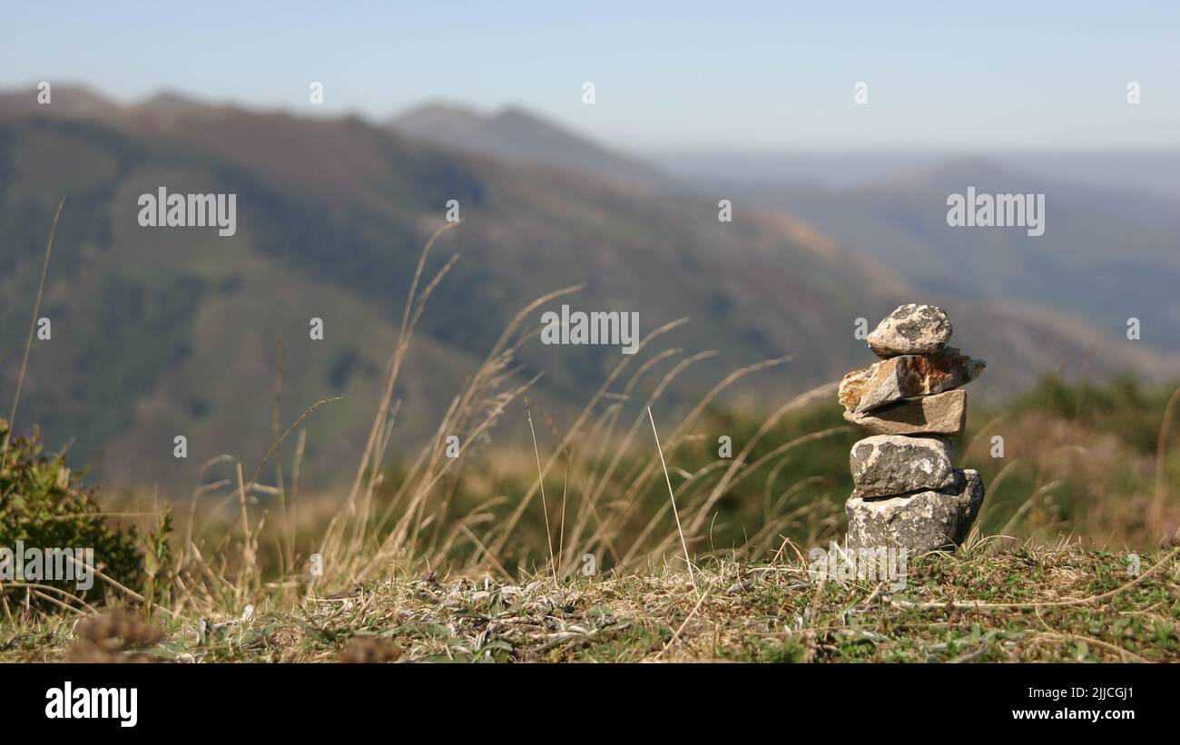 Camino de Santiago: A small stone cairn on the summit of the Ibaneta ...