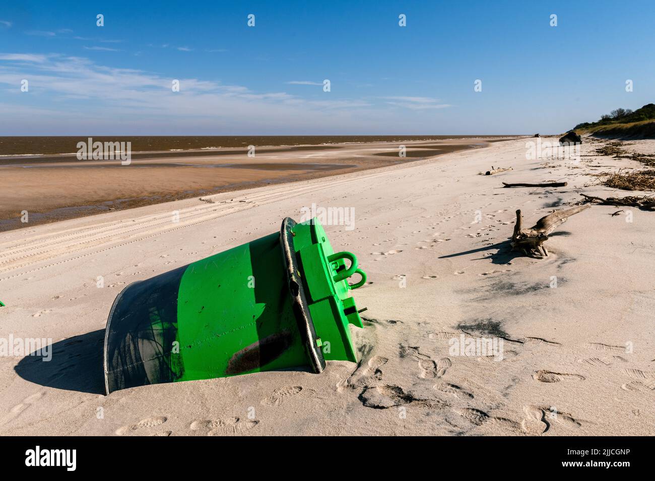 Green signaling beacon that ran aground on the beach, Kiyu, San José ...
