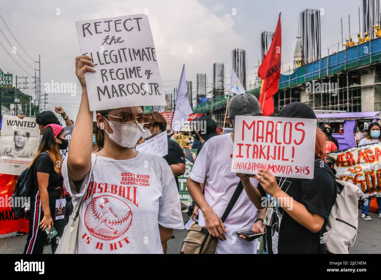 Protester holds placards expressing their opinions during the ...