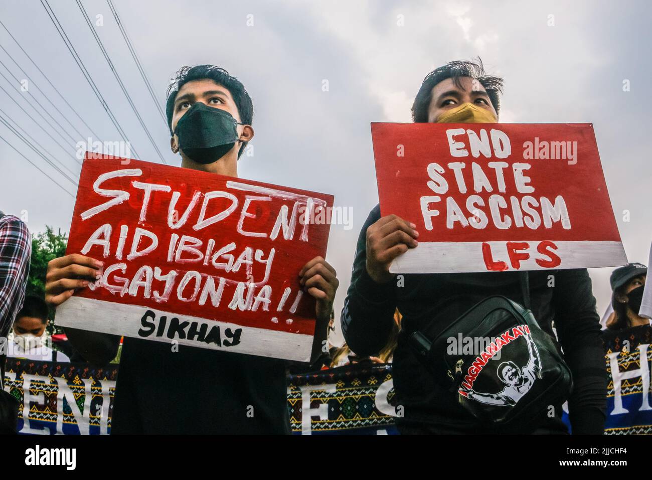 Protester holds placards expressing their opinions during the ...