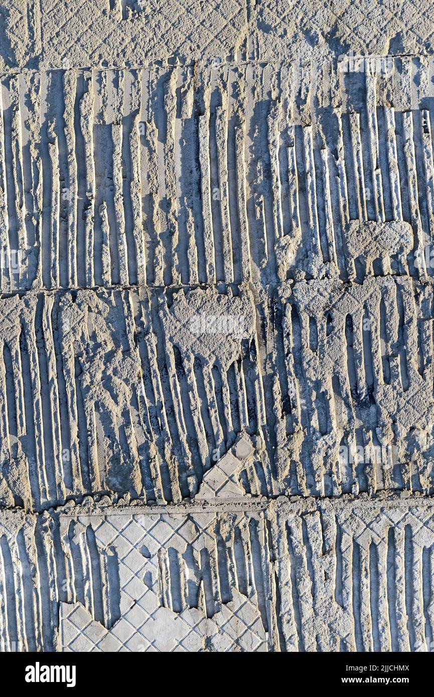 abstract uneven embossed textured concrete wall, stone material texture ...