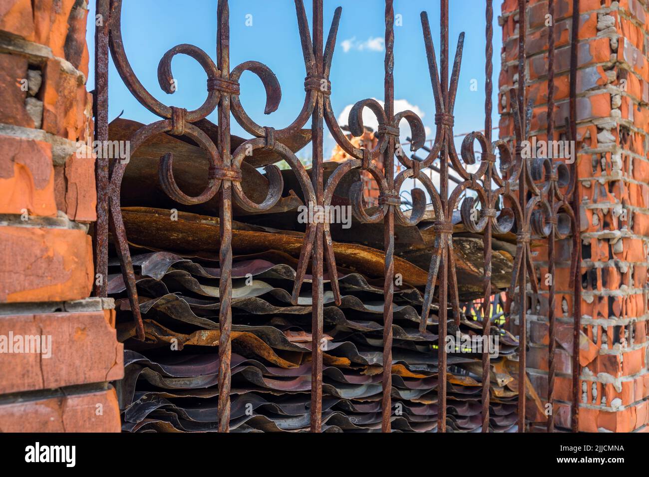 Beautiful decorative metal fence with artistic forging after a fire ...
