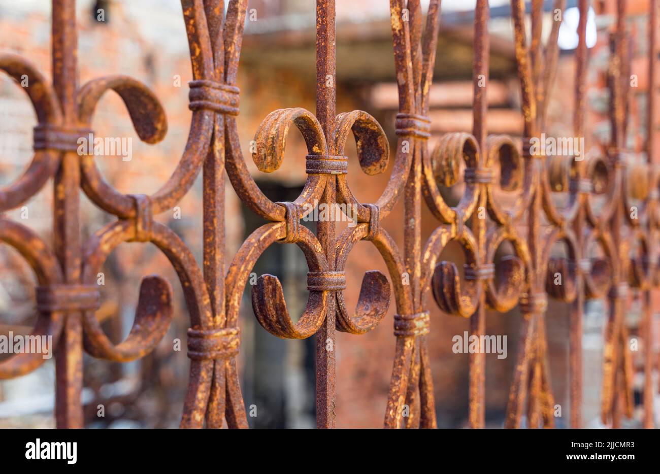 Beautiful decorative metal fence with artistic forging after a fire ...