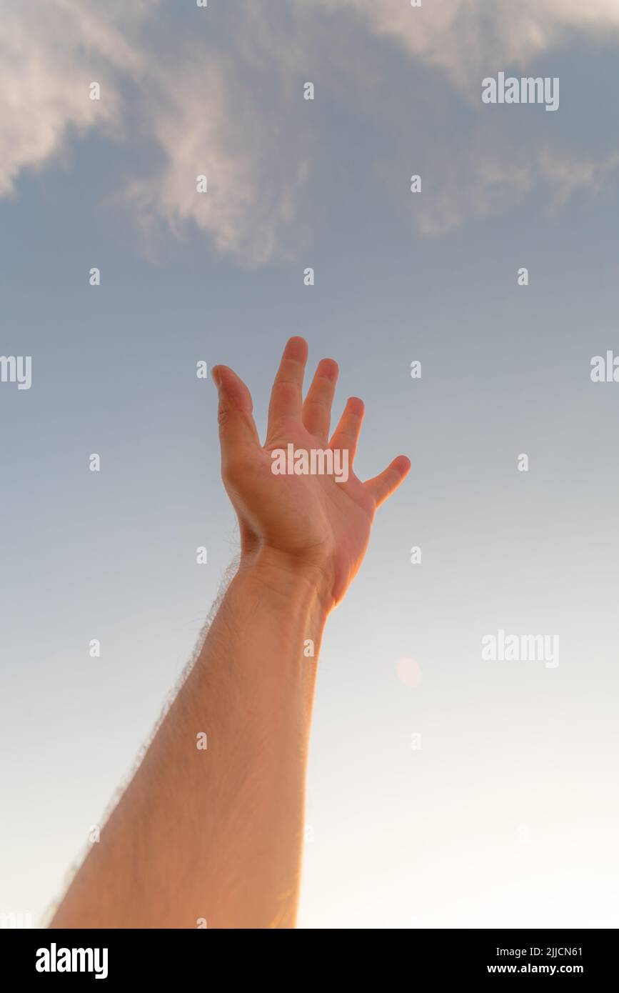 Hand reaching out palm up hi-res stock photography and images - Alamy