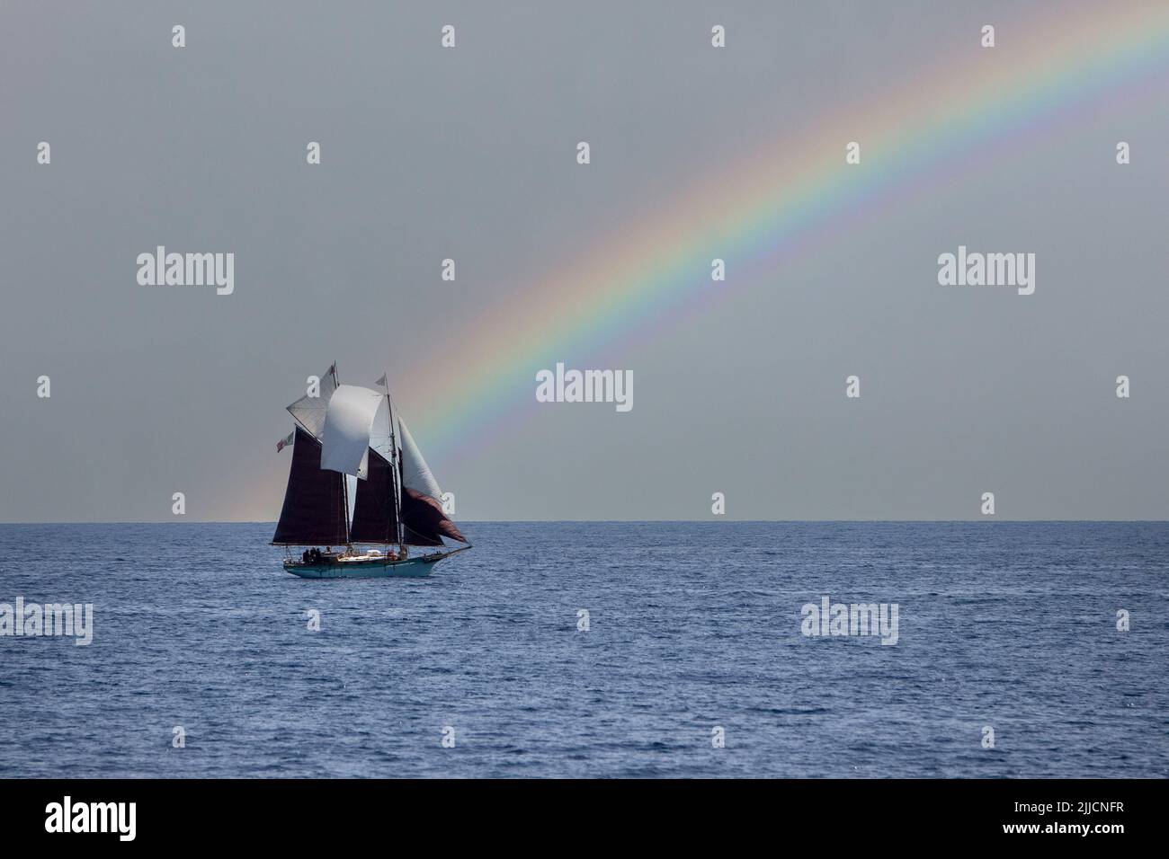 Sea yacht beach rainbow hi-res stock photography and images - Alamy