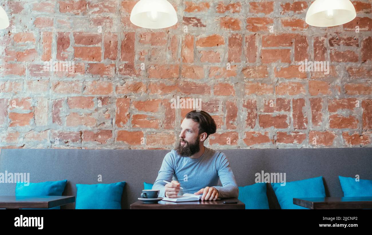 man writing planner waiting inspiration art hobby Stock Photo - Alamy
