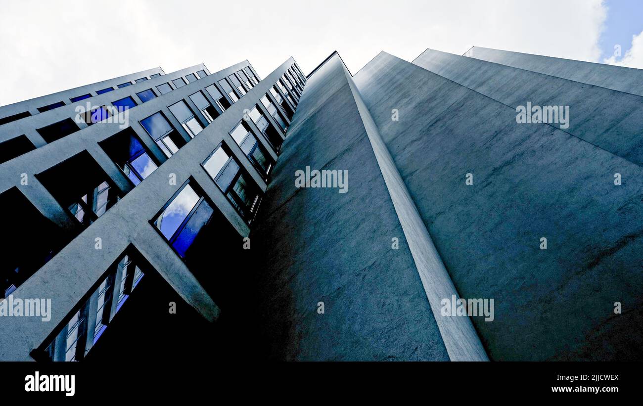 A high rise skyscraper building with clear sky background. Low angle ...