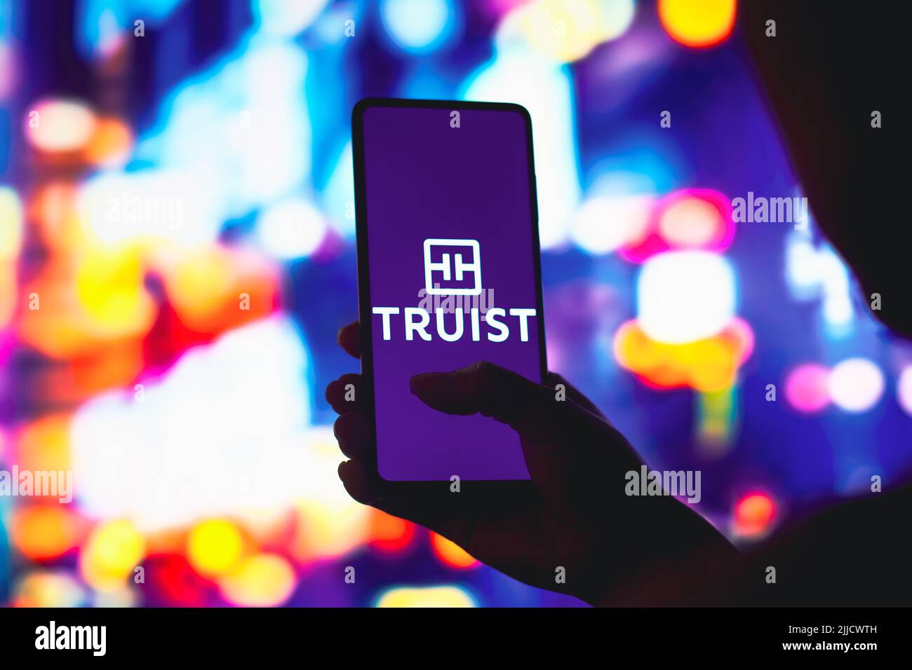 In this photo illustration, the Truist Financial Corp. logo is ...