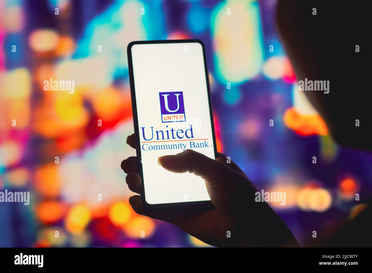 In this photo illustration, the United Community Bank logo is displayed ...