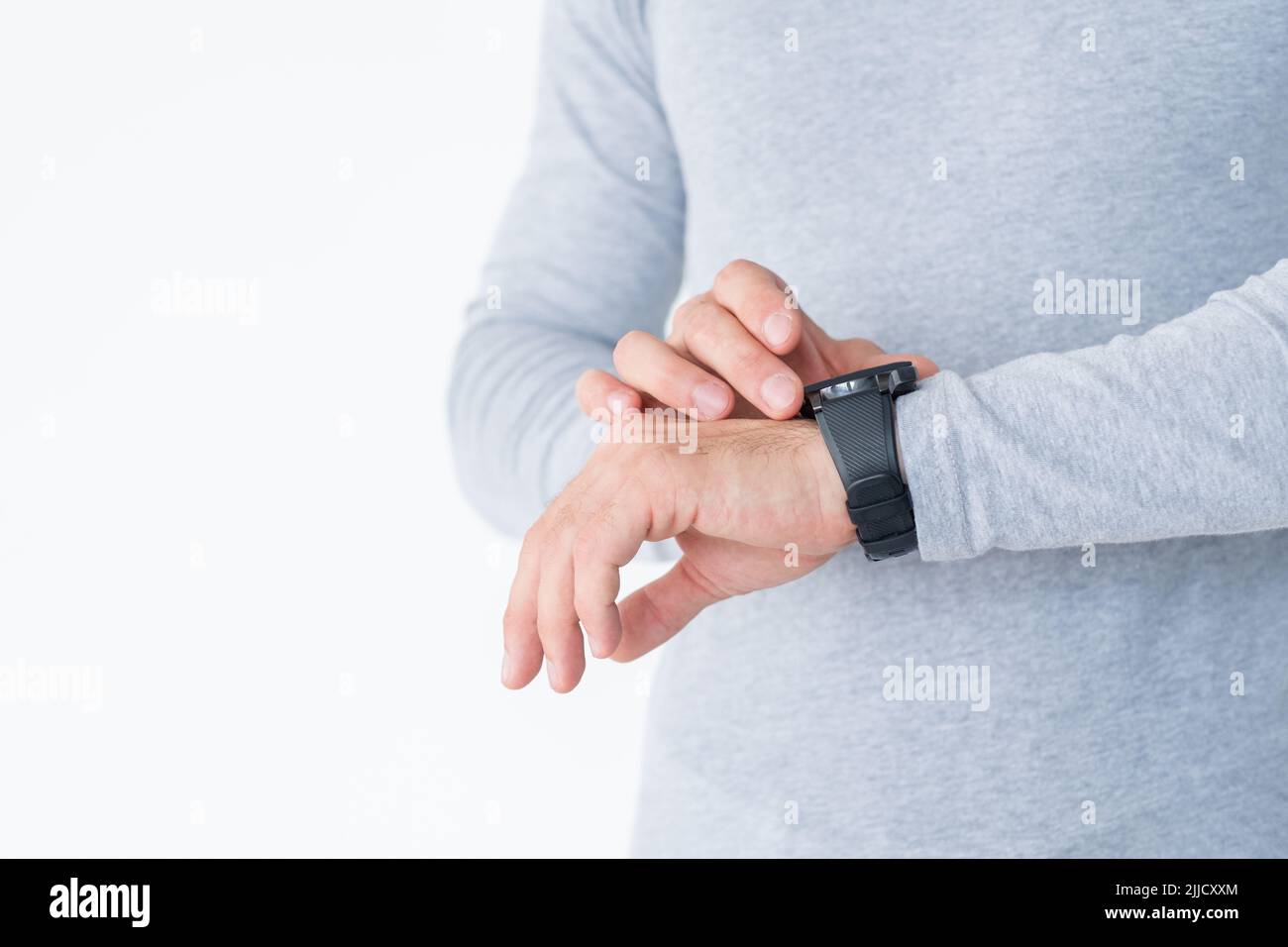 fitness tracker gadget man checking hand watch Stock Photo - Alamy