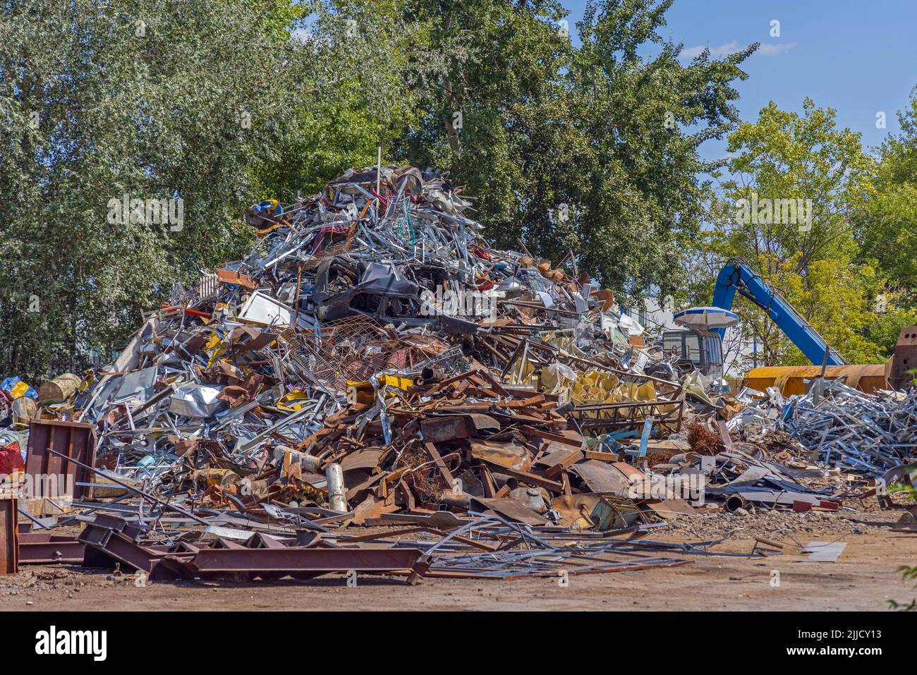 Big Pile of Iron Metal at Scrap Yard Recycling Facility Stock Photo - Alamy