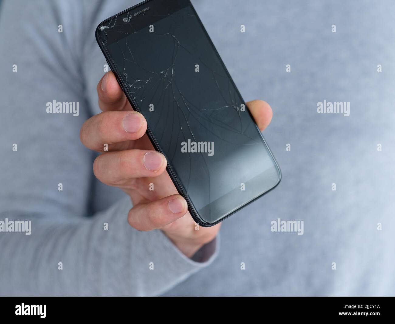 shatter cracked screen phone repair service Stock Photo - Alamy