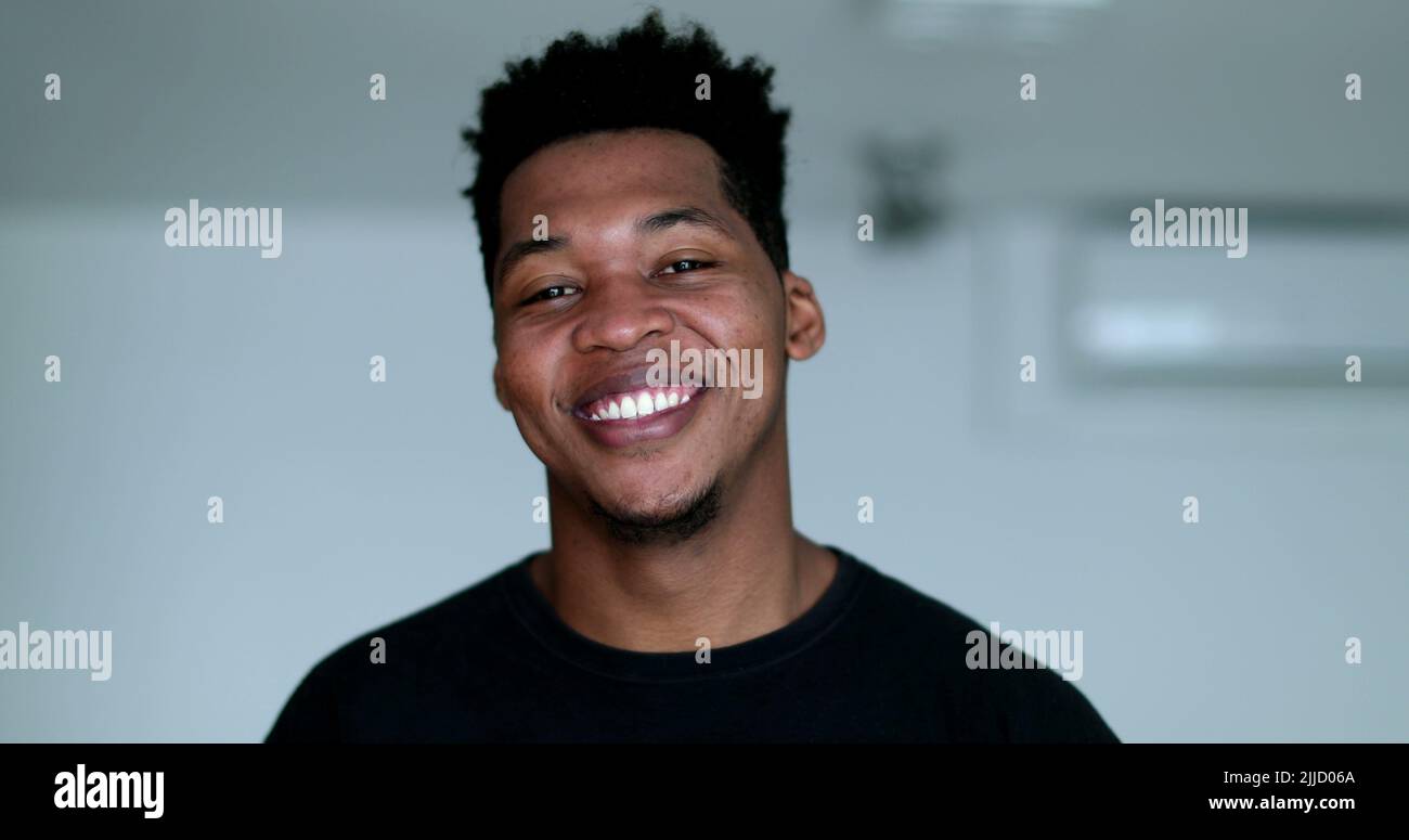 Happy young African American black man laughing and smiling Stock Photo ...