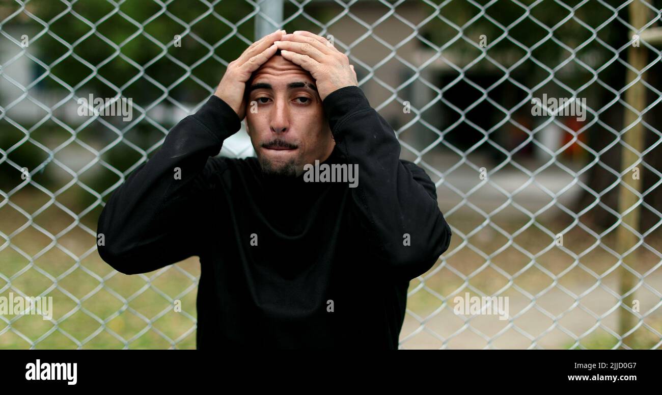 Hispanic latin bad boy guy walking outside towards camera Stock Photo ...