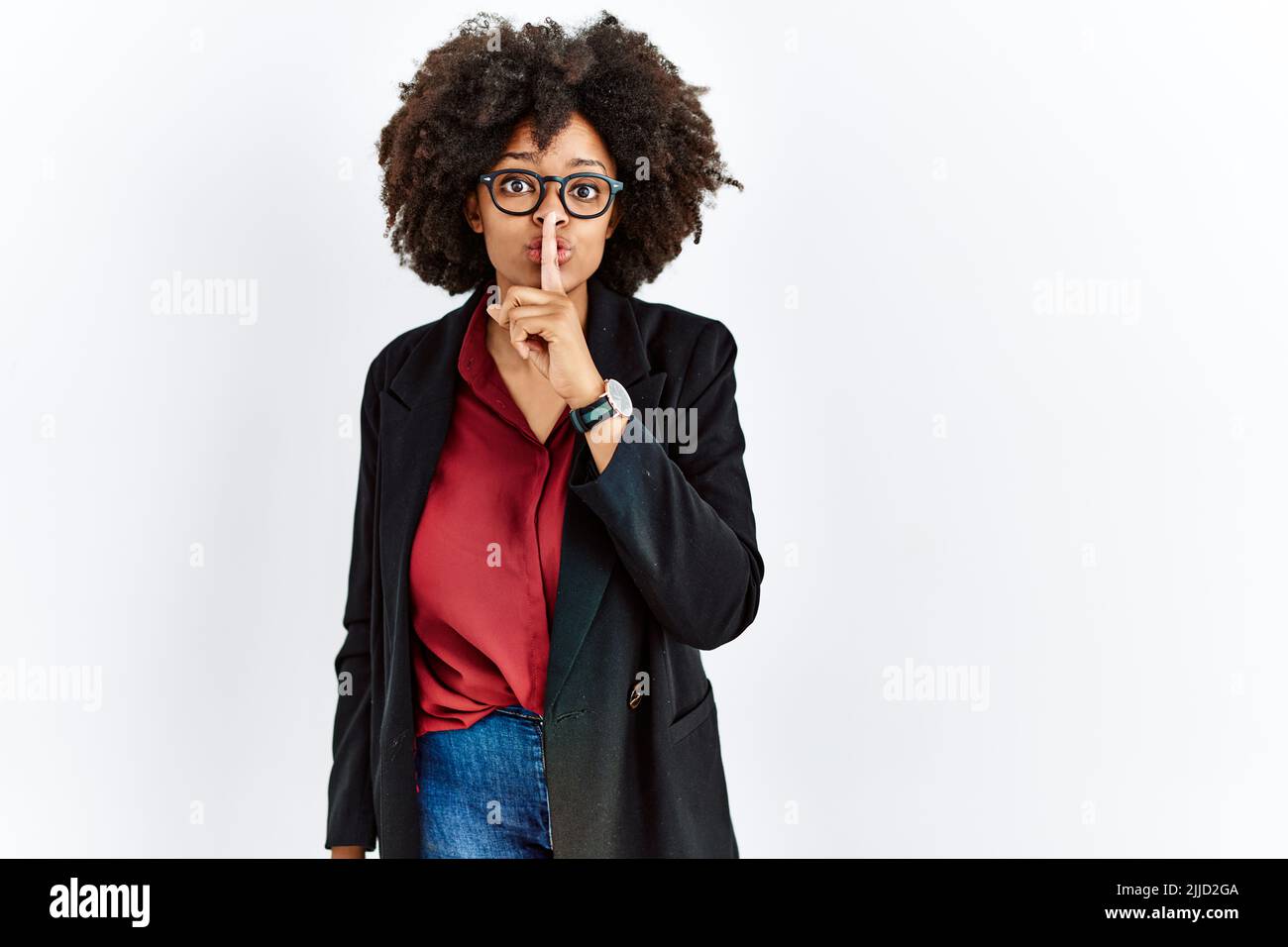 African american woman with afro hair wearing business jacket and ...
