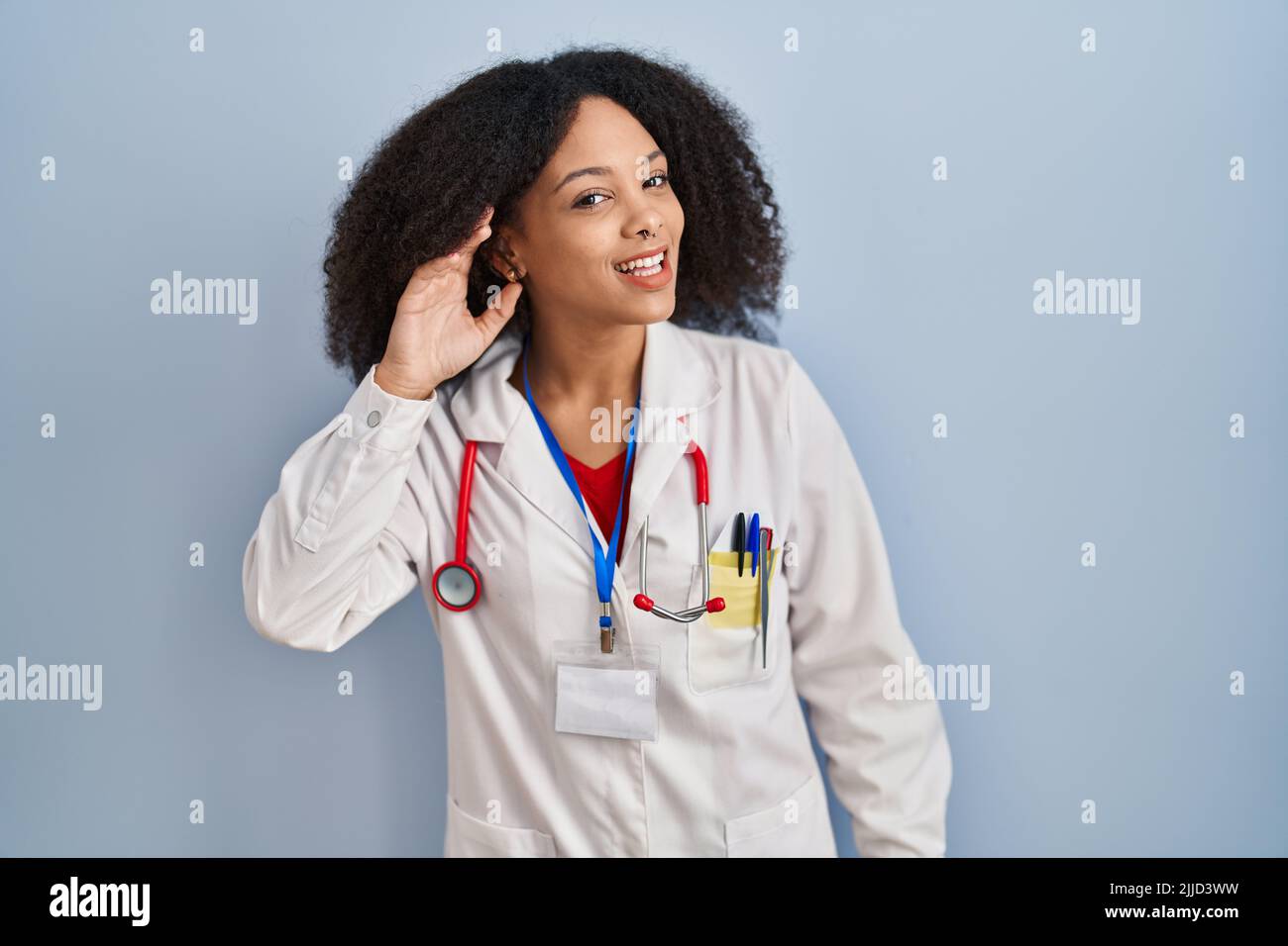 Young african american woman wearing doctor uniform and stethoscope ...