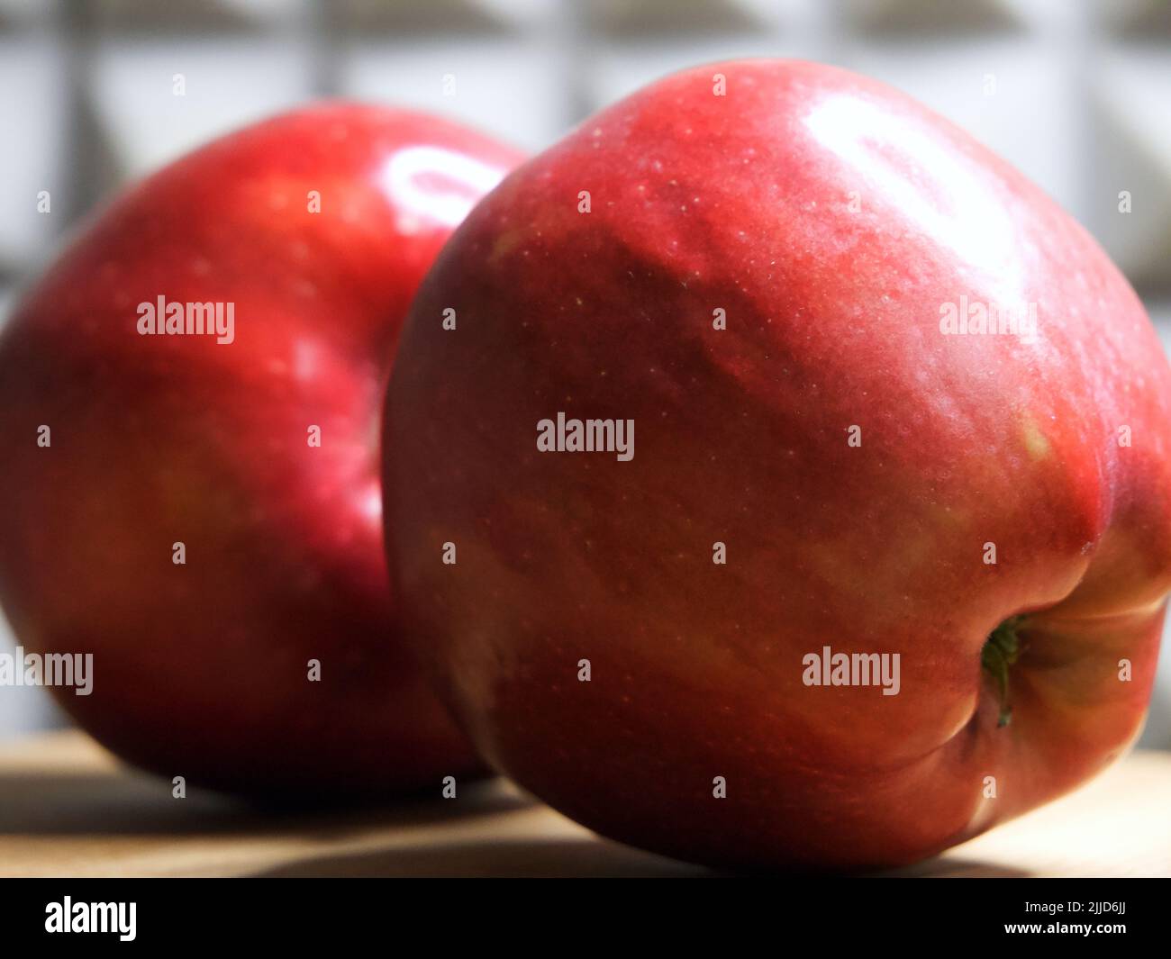 Two red apples of the red chief variety, a close-up shot Stock Photo ...