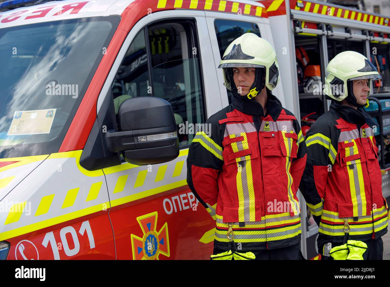 KYIV, UKRAINE - JULY 25, 2022 - Rescuers stand by one of the vehicles ...
