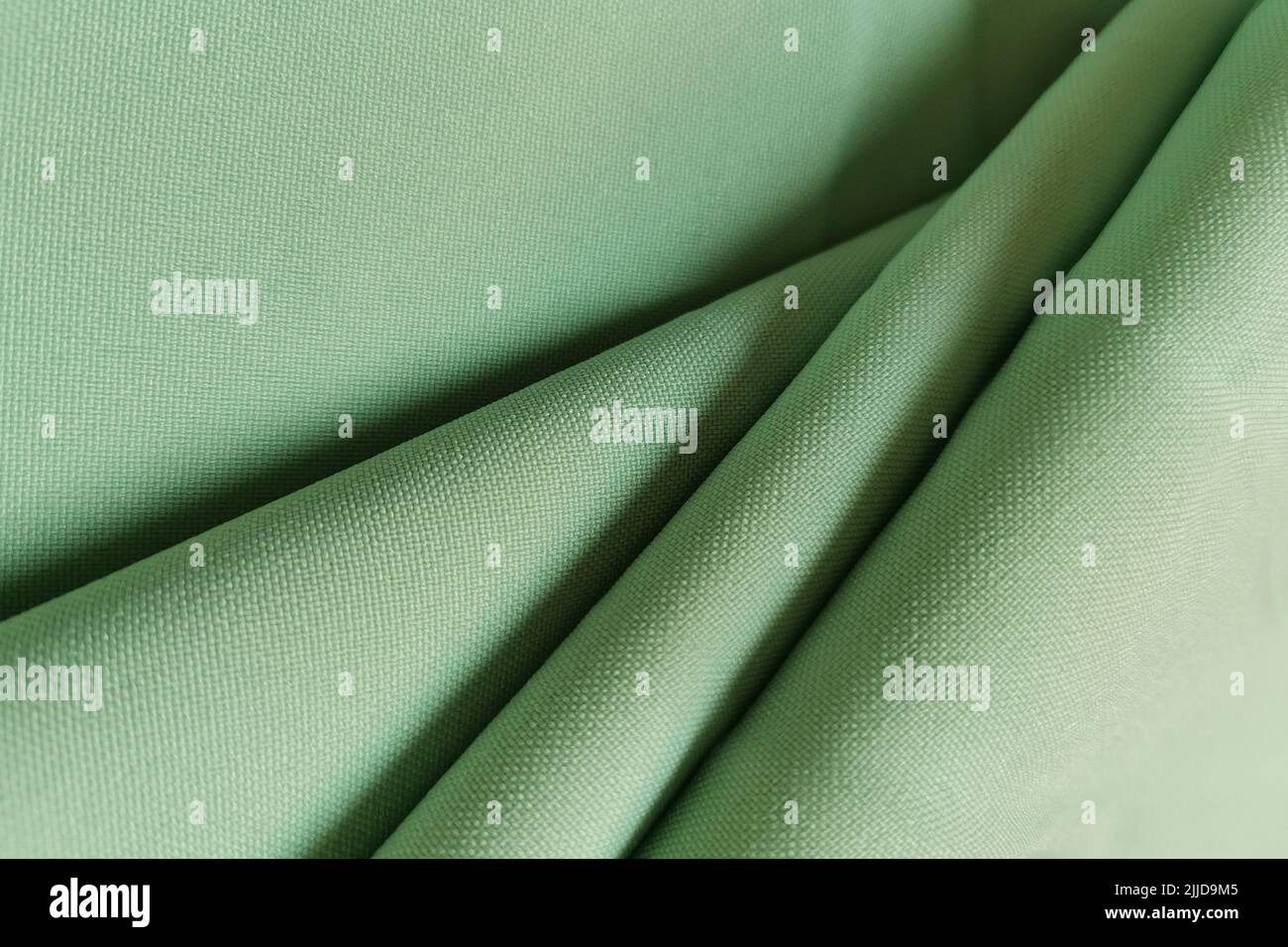 Green crumpled or wavy fabric texture background. Abstract linen cloth ...