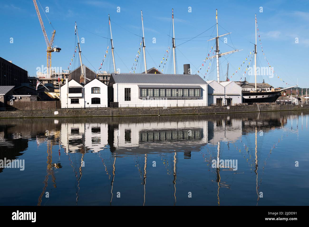 The masts of SS Great Britain are reflected in the River Avon's calm ...