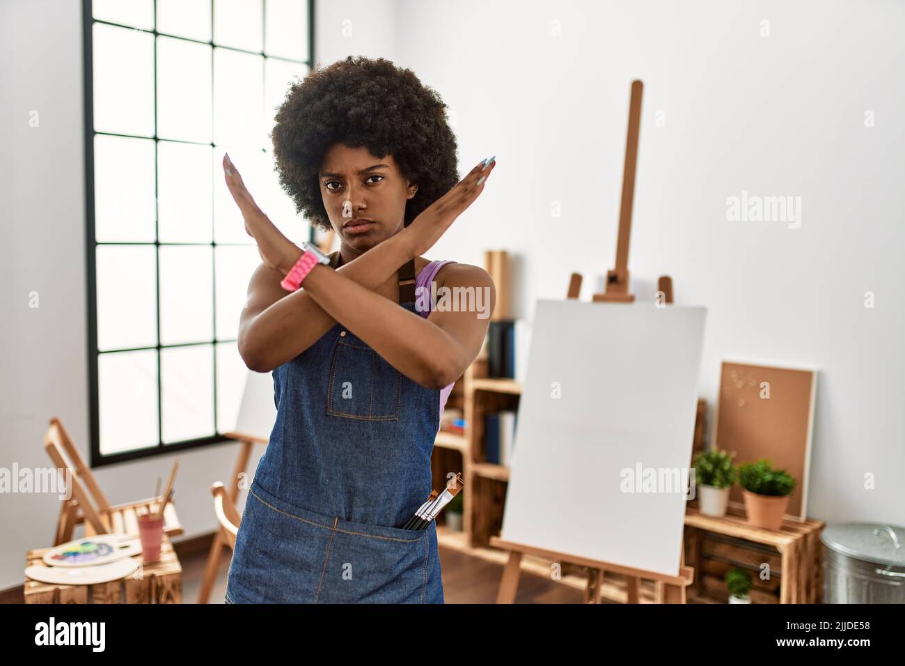 Young african american woman with afro hair at art studio rejection ...