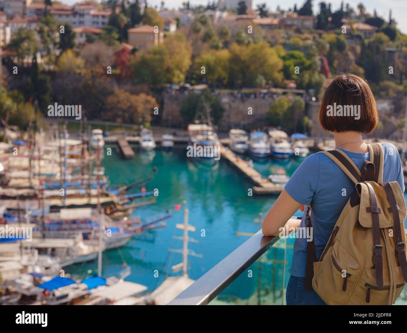 travel to Turkey, old town Antalya Kaleci. Happy asian female tourist ...