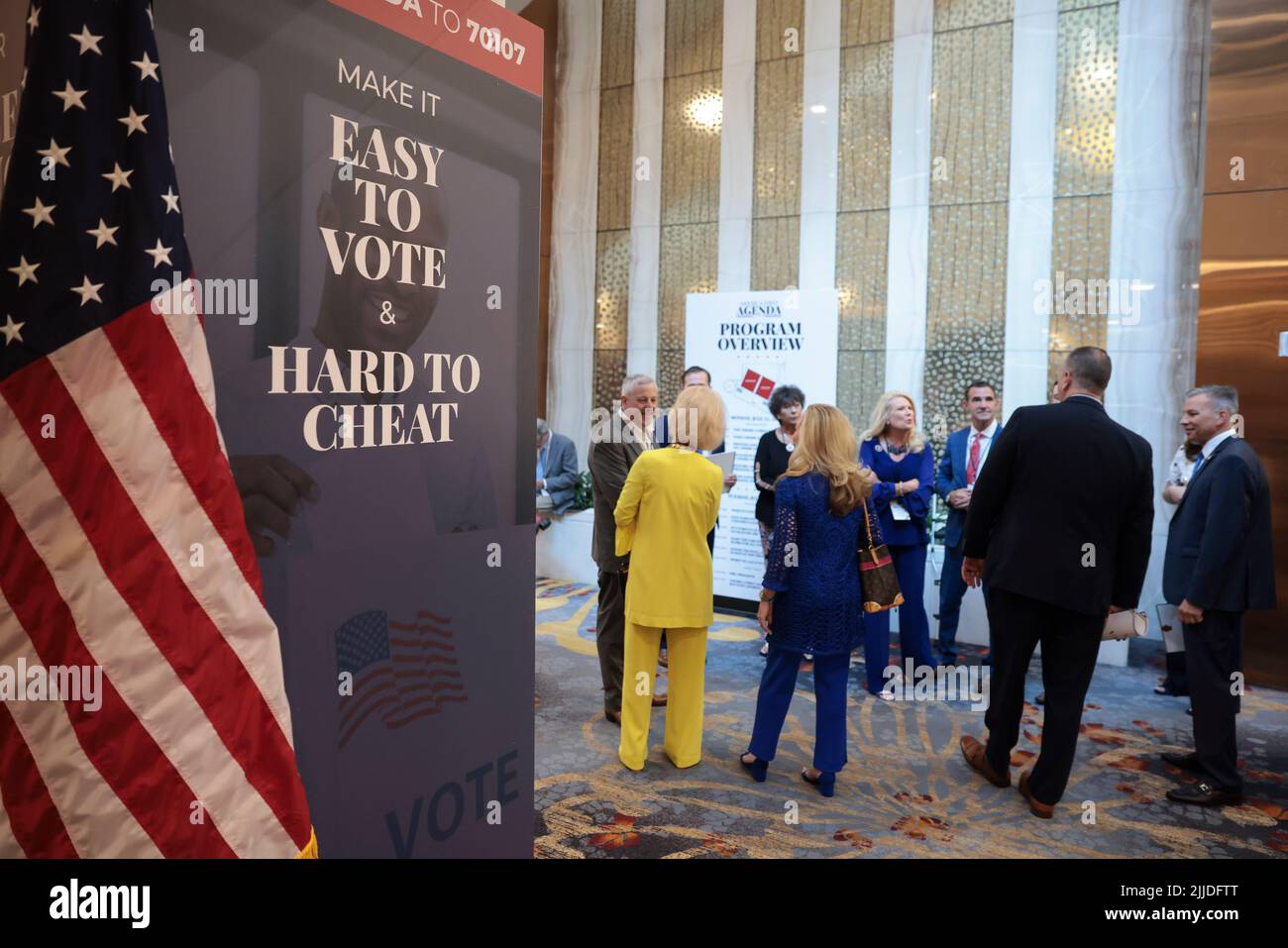 People gather as they attend the ÔAmerica First Agenda SummitÕ ...